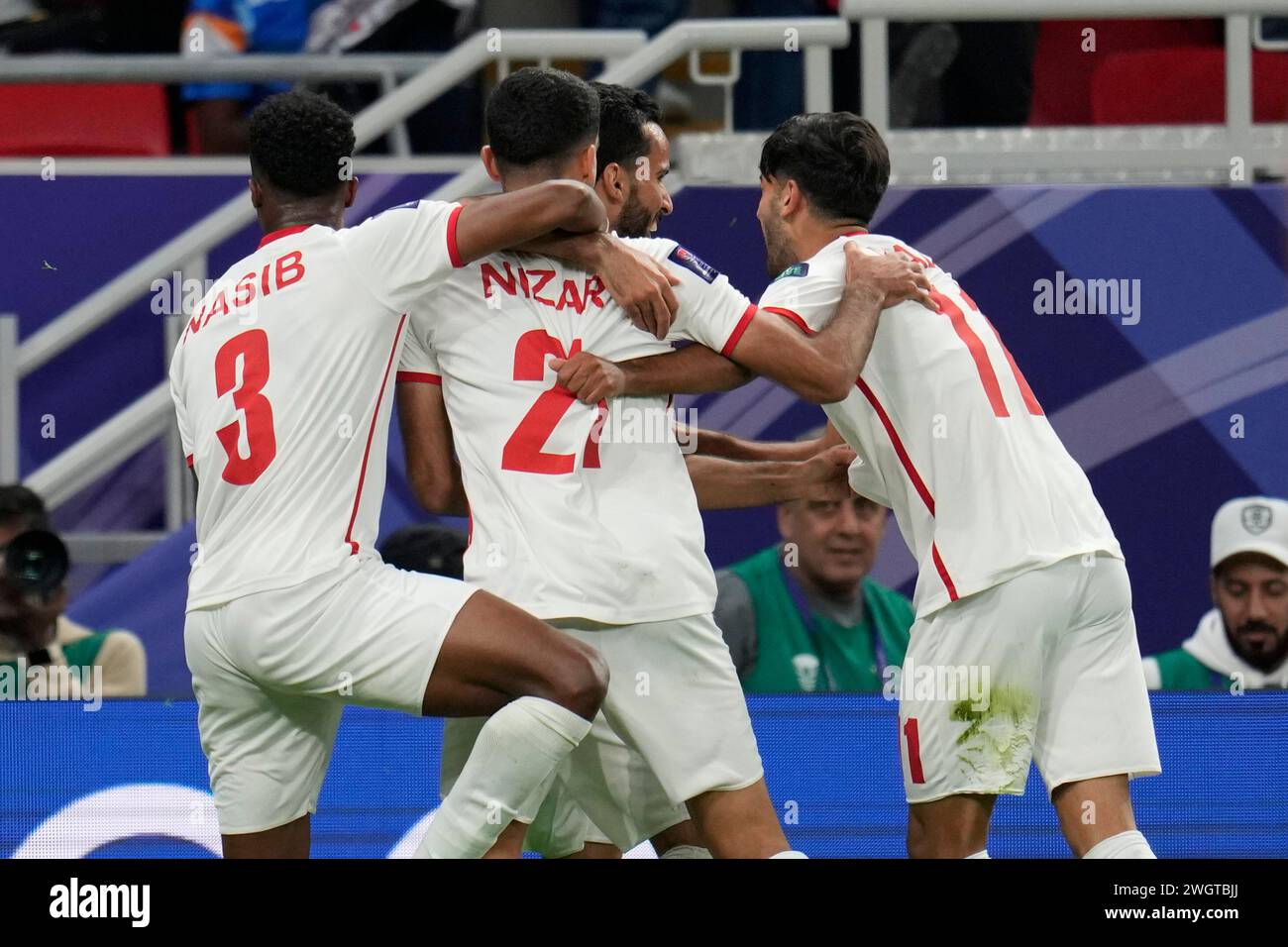 Jordan's Yazan Alnaimat, right, celebrates after scoring his side's ...
