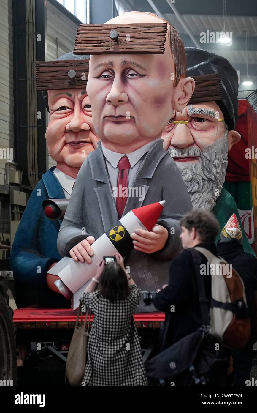 A carnival float depicts Russia's president Vladimir Putin, China's ...