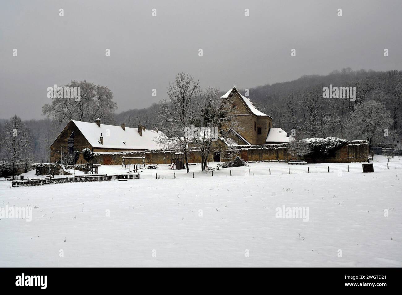 Austria, Winter landscape with St. Anna Monastery in the Mannersdorf ...