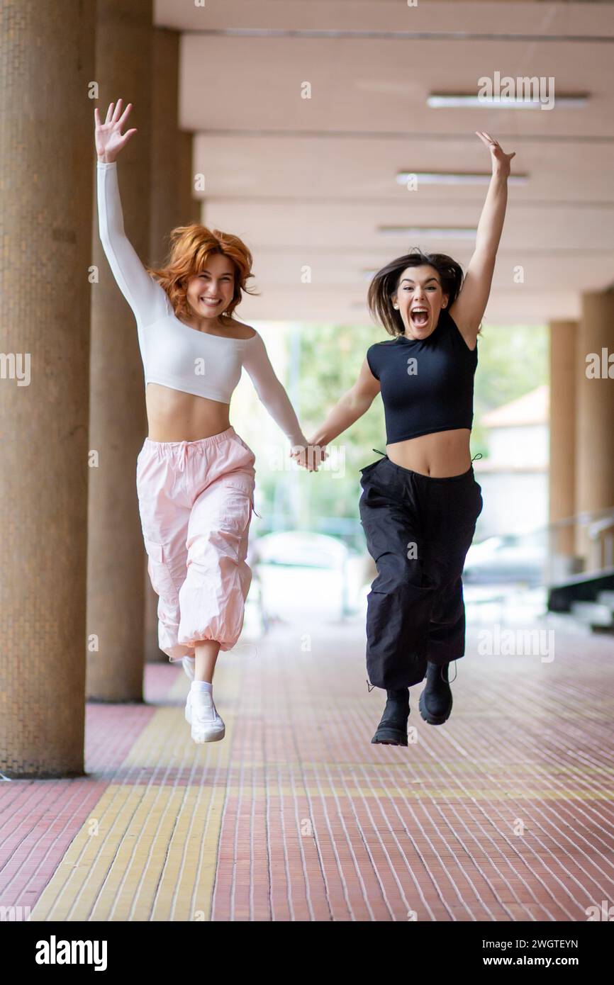 Black couple cheering jumping hi-res stock photography and images - Alamy