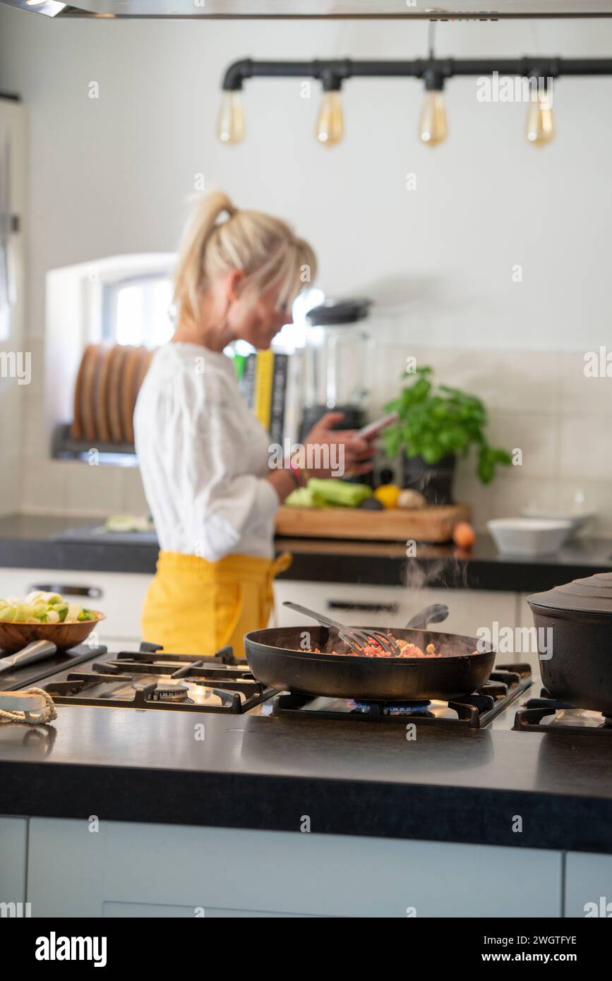 Cooking on gas stove hi-res stock photography and images - Alamy