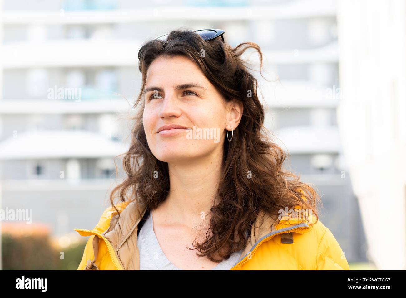 young woman standing outside Stock Photo - Alamy