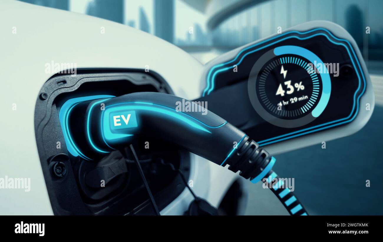 Closeup EV charger plug into electric car for electric recharging from ...
