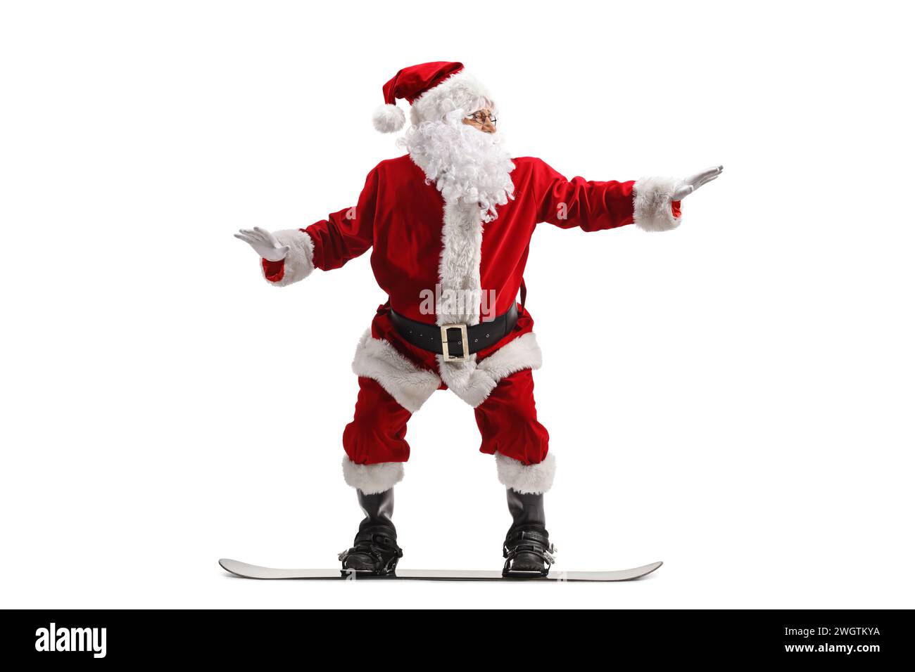Santa claus riding a snowboard isolated on white background Stock Photo ...