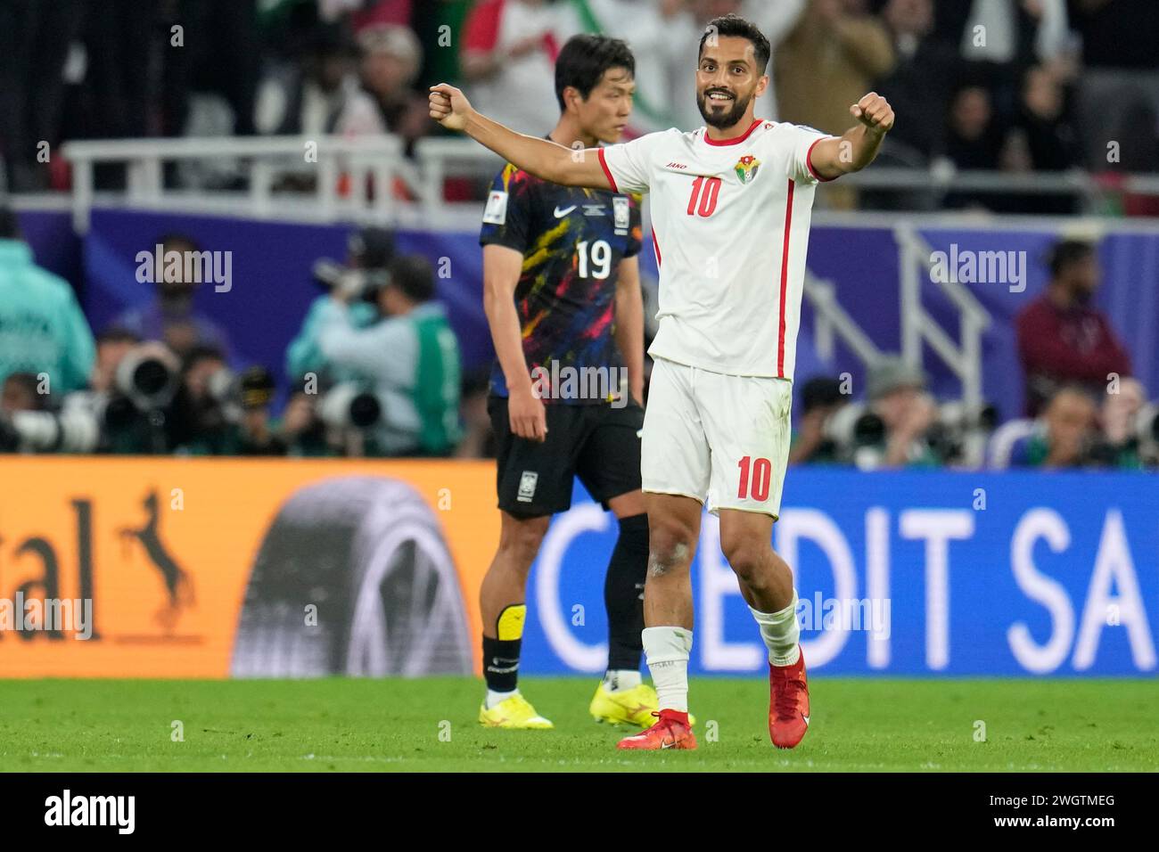 Jordan's Mousa Altamari celebrates as South Korea's Kim Young-gwon ...