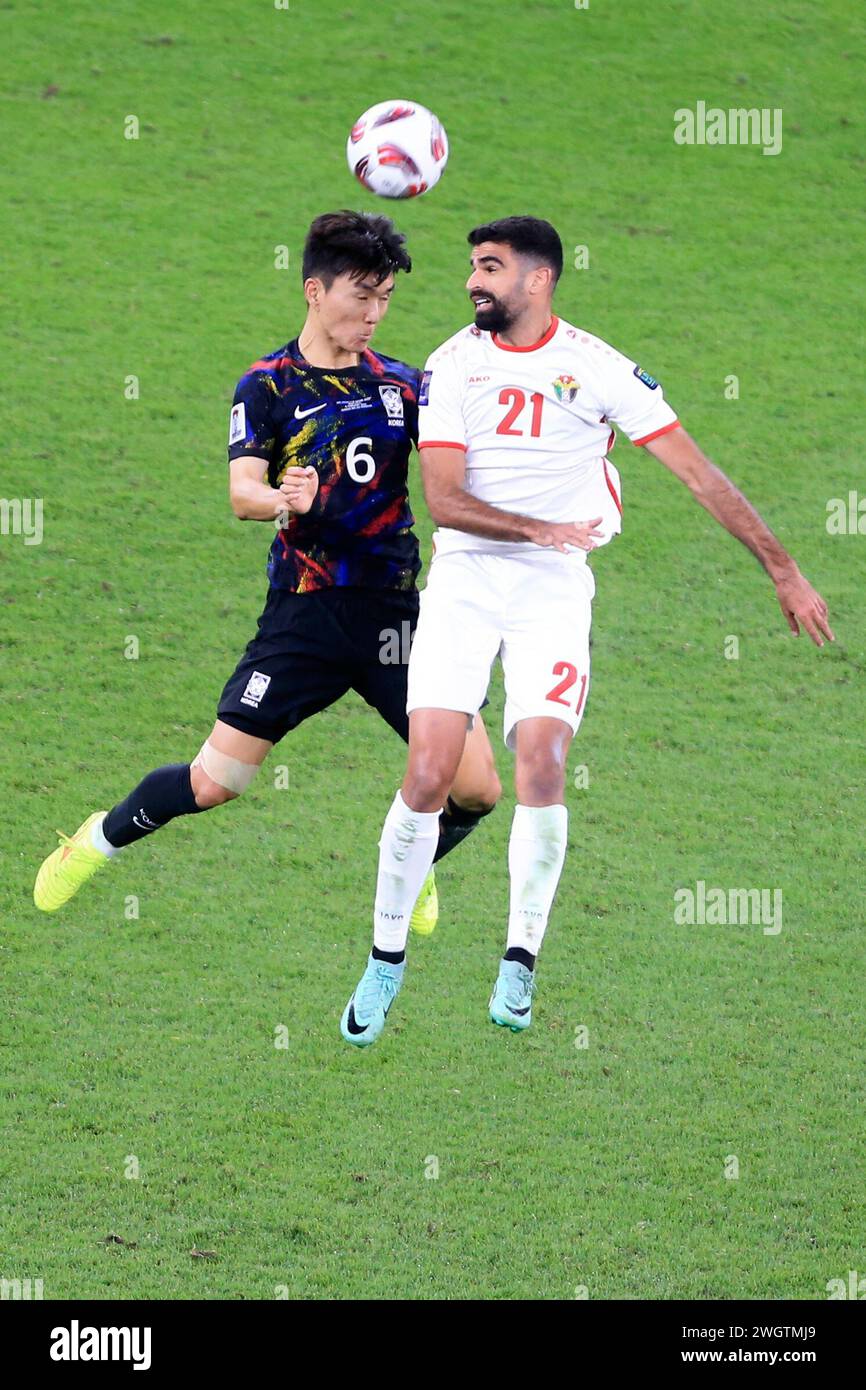 Jordan's Nizar Alrashdan, right, and South Korea's Hwang In-beom go for ...