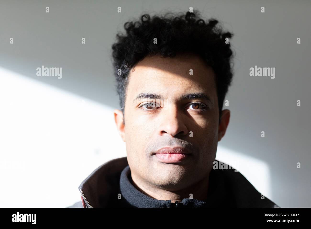 Portrait indoors young afro hi-res stock photography and images - Alamy