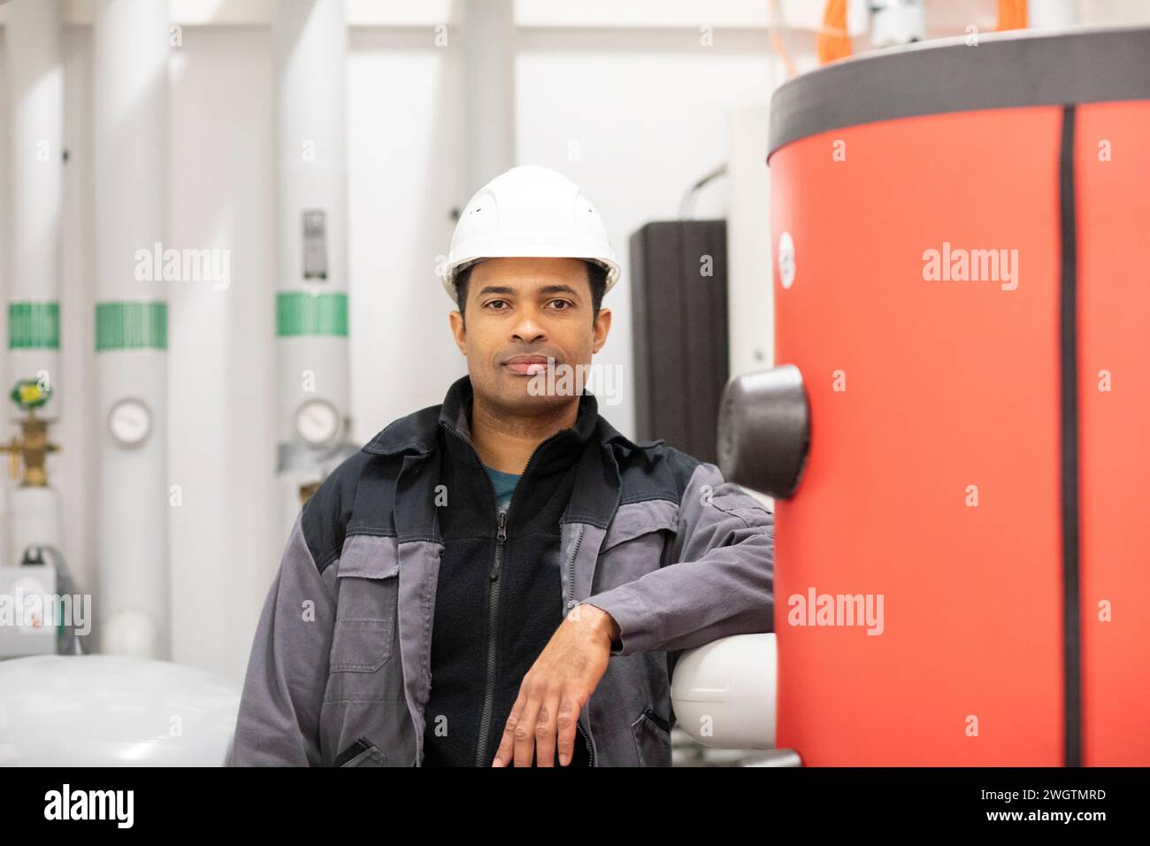Engineer looking camera standing power hi-res stock photography and ...