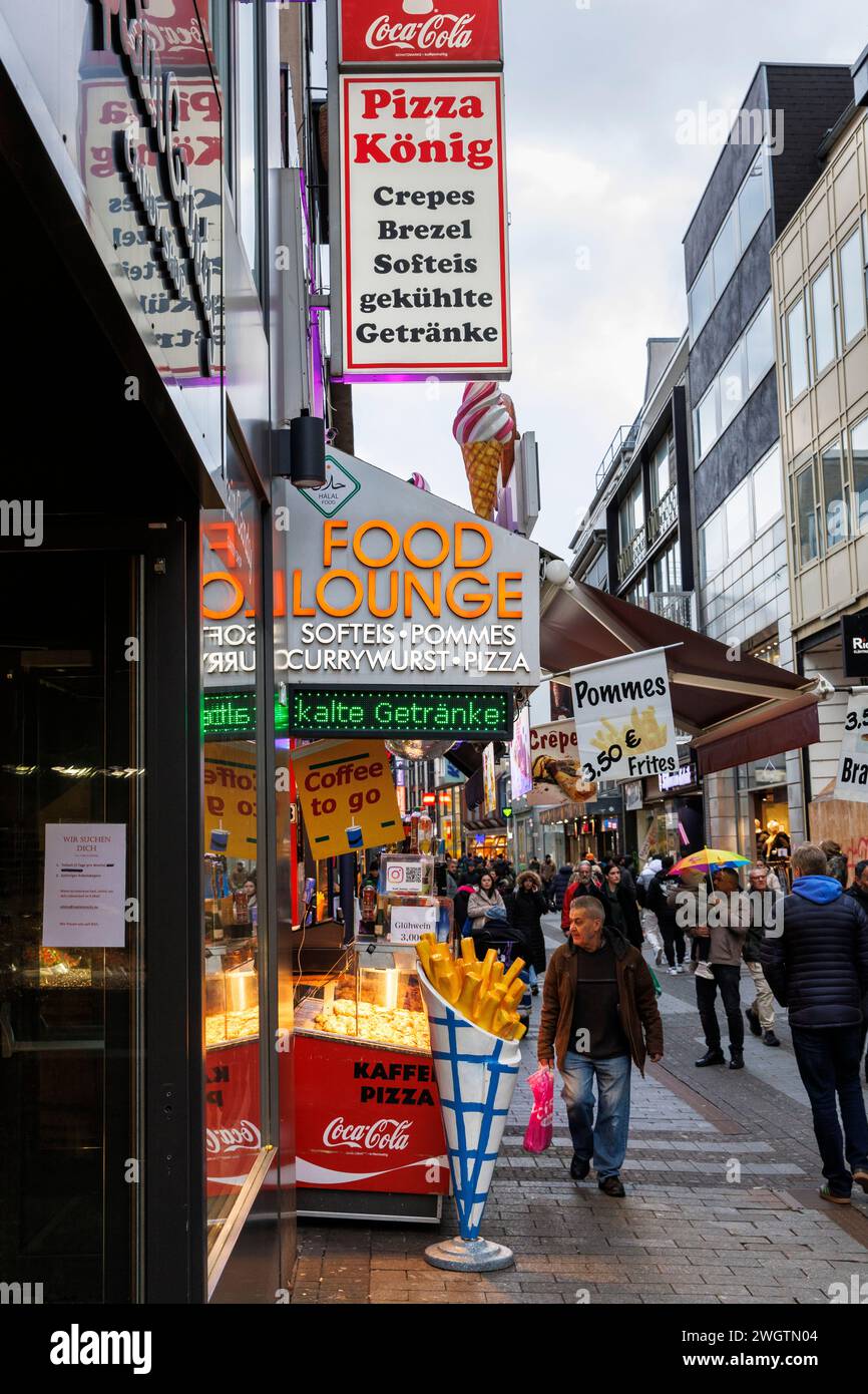 snack bar on shopping street Hohe Strasse, Cologne, Germany. Imbiss in ...