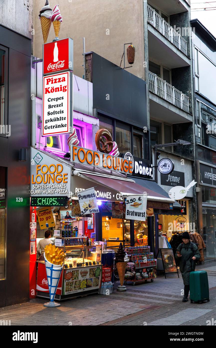 snack bar on shopping street Hohe Strasse, Cologne, Germany. Imbiss in ...
