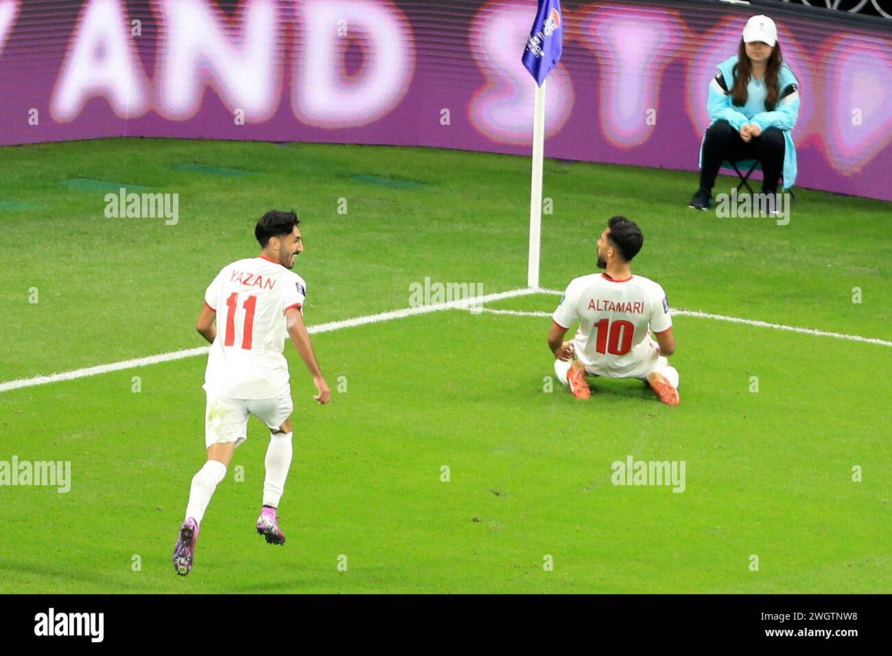 Jordan's Mousa Altamari, right, celebrates after scoring during the ...