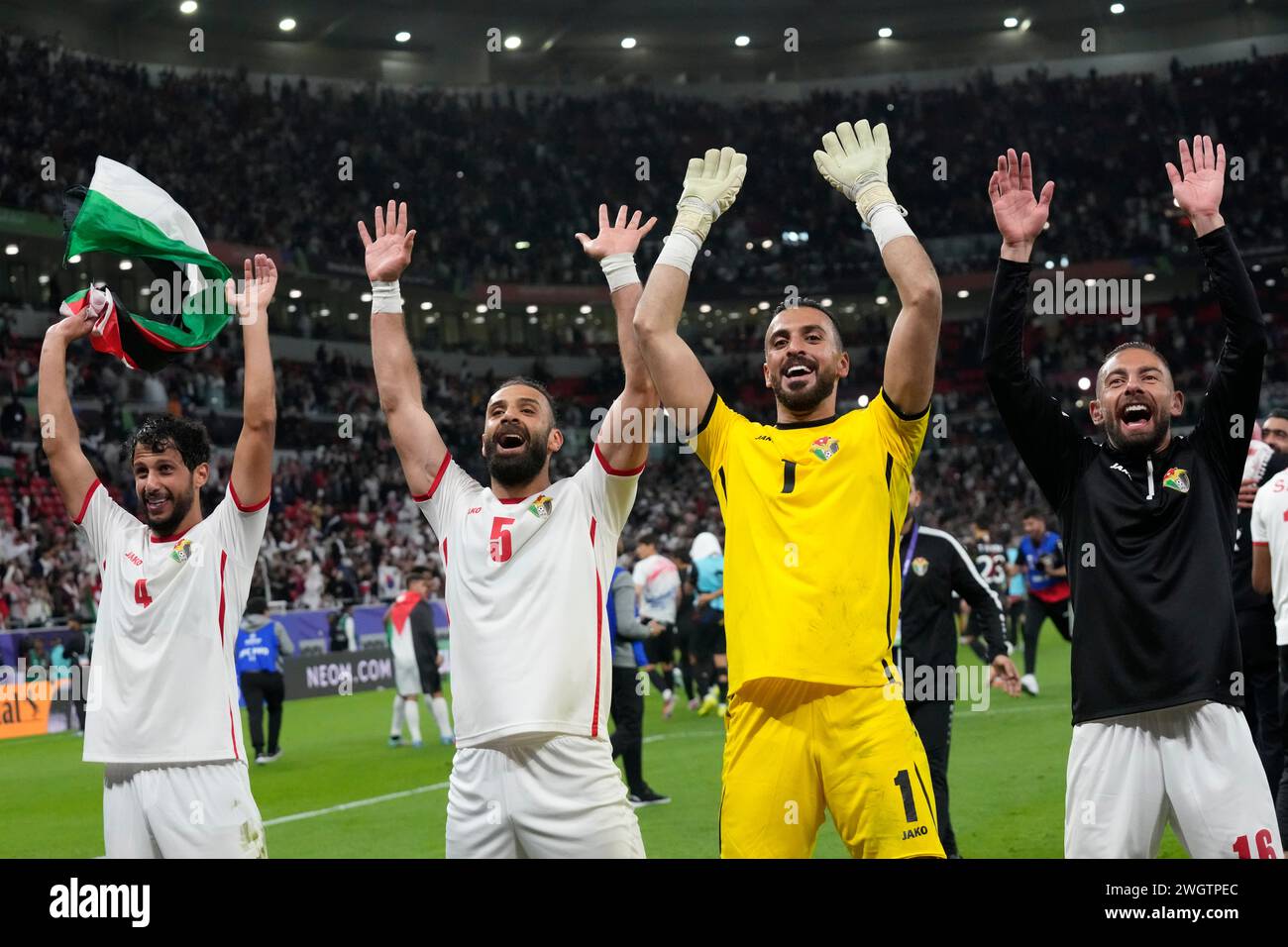 Jordan players celebrate after the Asian Cup semifinal soccer match ...
