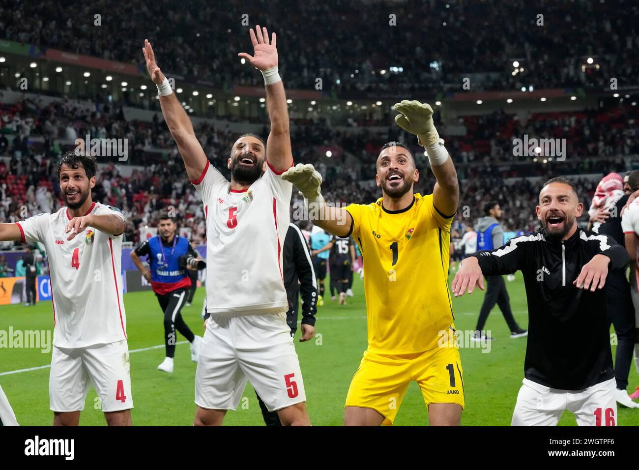 Jordan players celebrate after the Asian Cup semifinal soccer match ...