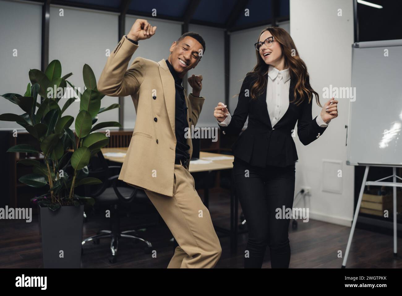 Excited diverse employees team celebrating teamwork success Stock Photo ...