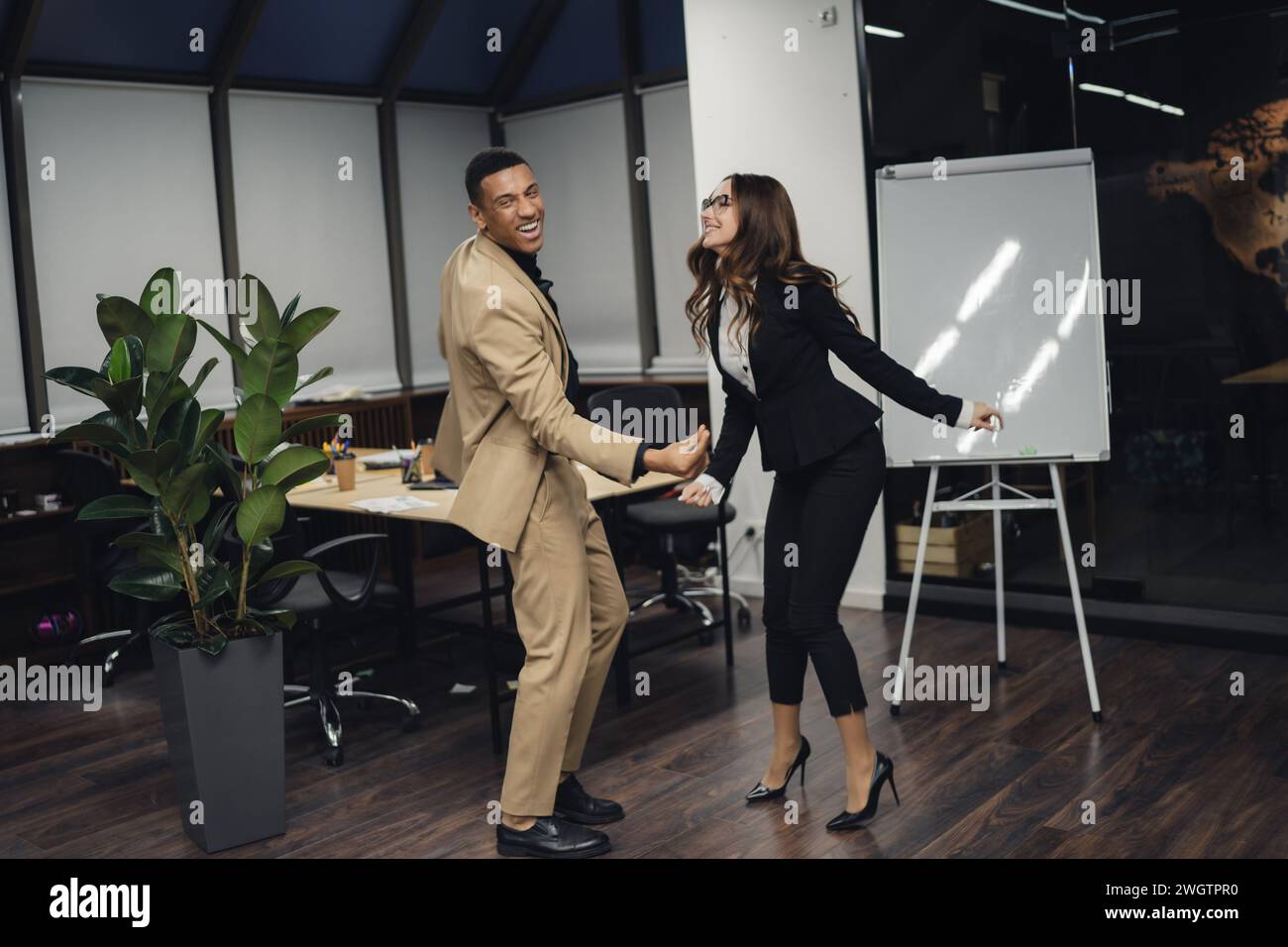 Excited diverse employees team celebrating teamwork success Stock Photo ...