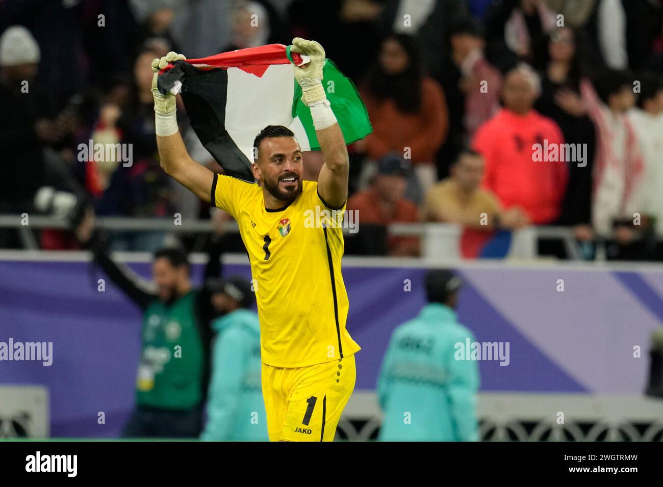 Jordan's goalkeeper Yazeed Abulaila celebrates after the Asian Cup ...