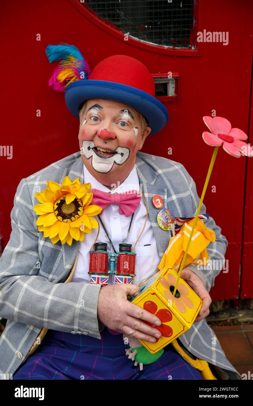 A clown outside All Saints Church in east London for the 78th Annual ...