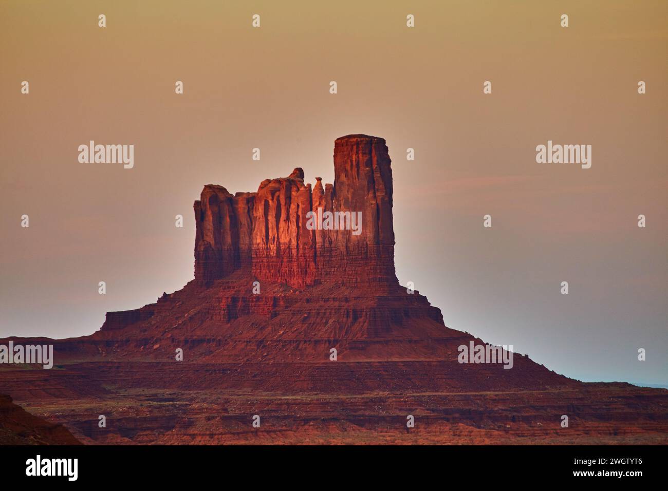 Twilight Glow on Monument Valley Butte, Arizona - Serene Desert Majesty ...