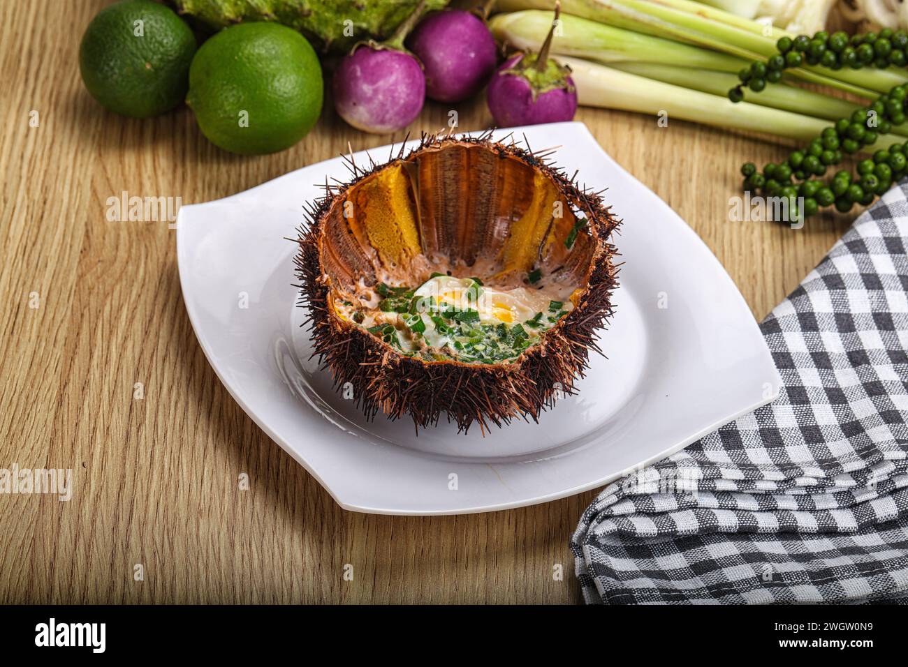 Delicous Grilled Sea Urchin with egg Stock Photo - Alamy