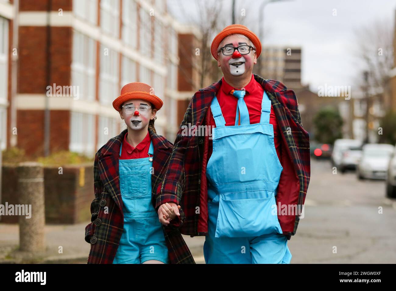 London, UK. 4th Feb, 2024. Clowns arrive at All Saints Church in east ...