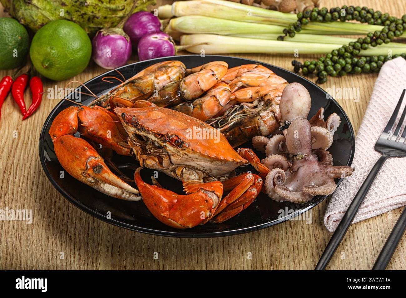 Luxury seafood mix - crab, tiger prawn, octopus Stock Photo - Alamy
