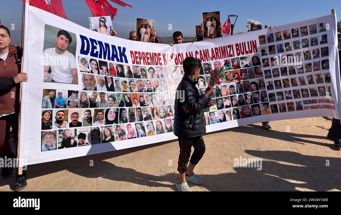 A demonstration against the slow recovery of earthquake-damaged areas ...