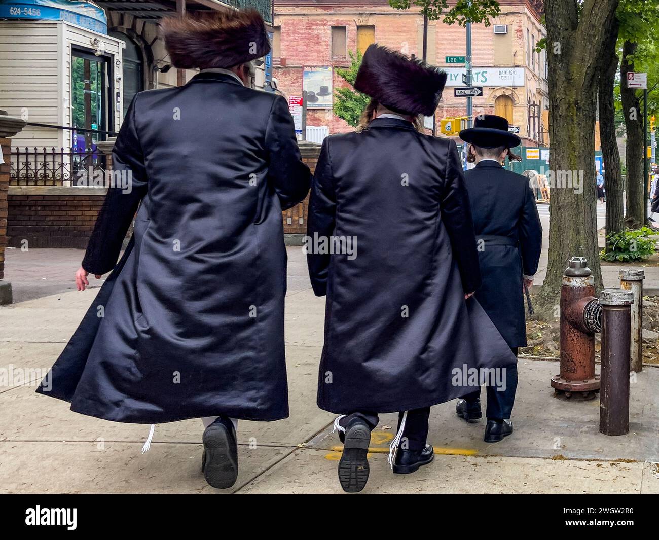 New York, USA; June 3, 2023: Orthodox Jewish men walking through the ...