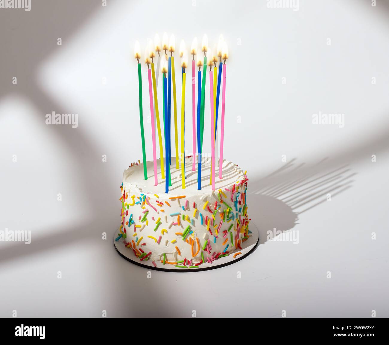 Birthday bento cake with high tall candles, sunlight, sunny day Stock ...