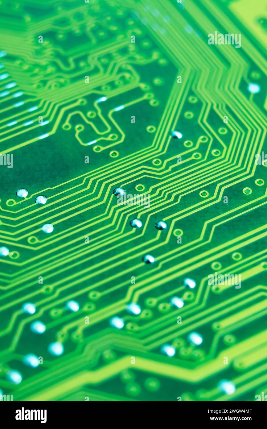 Tracks on the green PCB close up, background or texture Stock Photo - Alamy