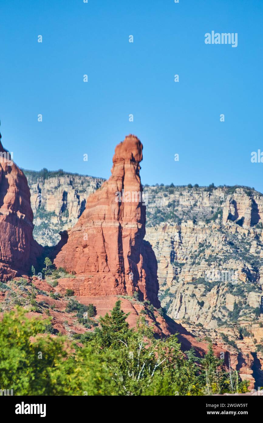 Sedona Red Rock Spire with Lush Greenery and Cliffs Stock Photo - Alamy