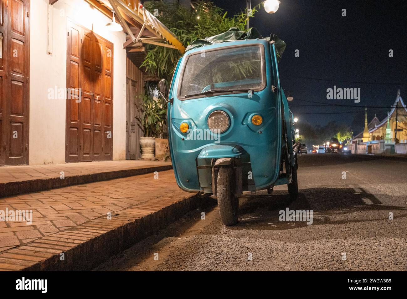 A Tuk Tuk Vehicle at a Street in the historical Old Town of Lubang ...