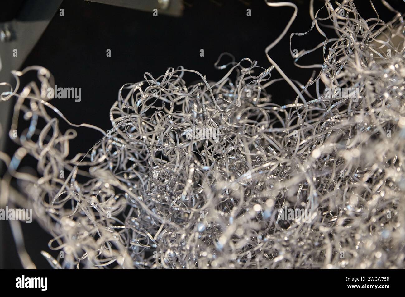 Chaotic Metallic Wire Entanglement with Light Reflections Stock Photo ...