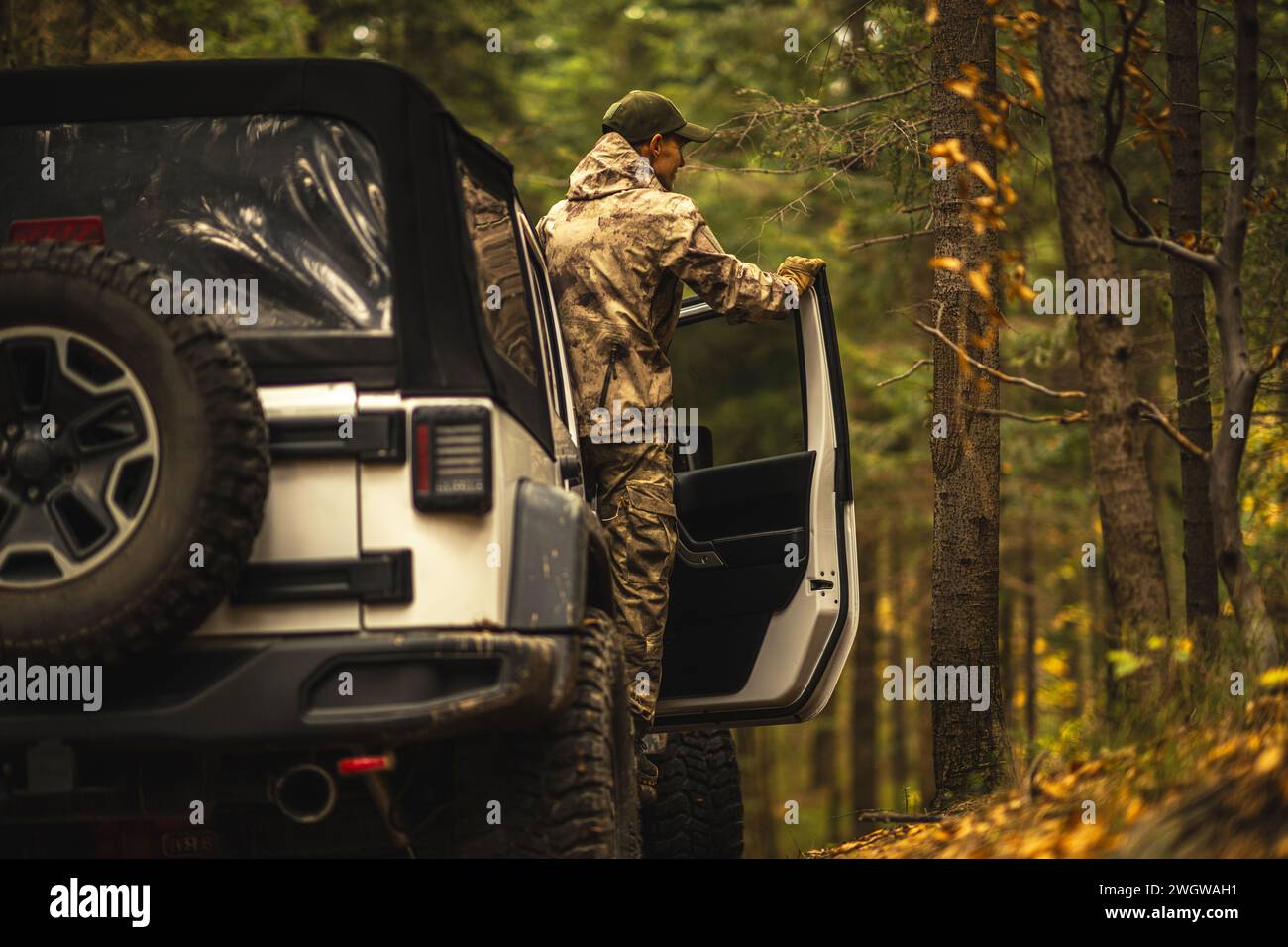 Animal Hunter Taking a Look From All Wheels Drive Vehicle During ...