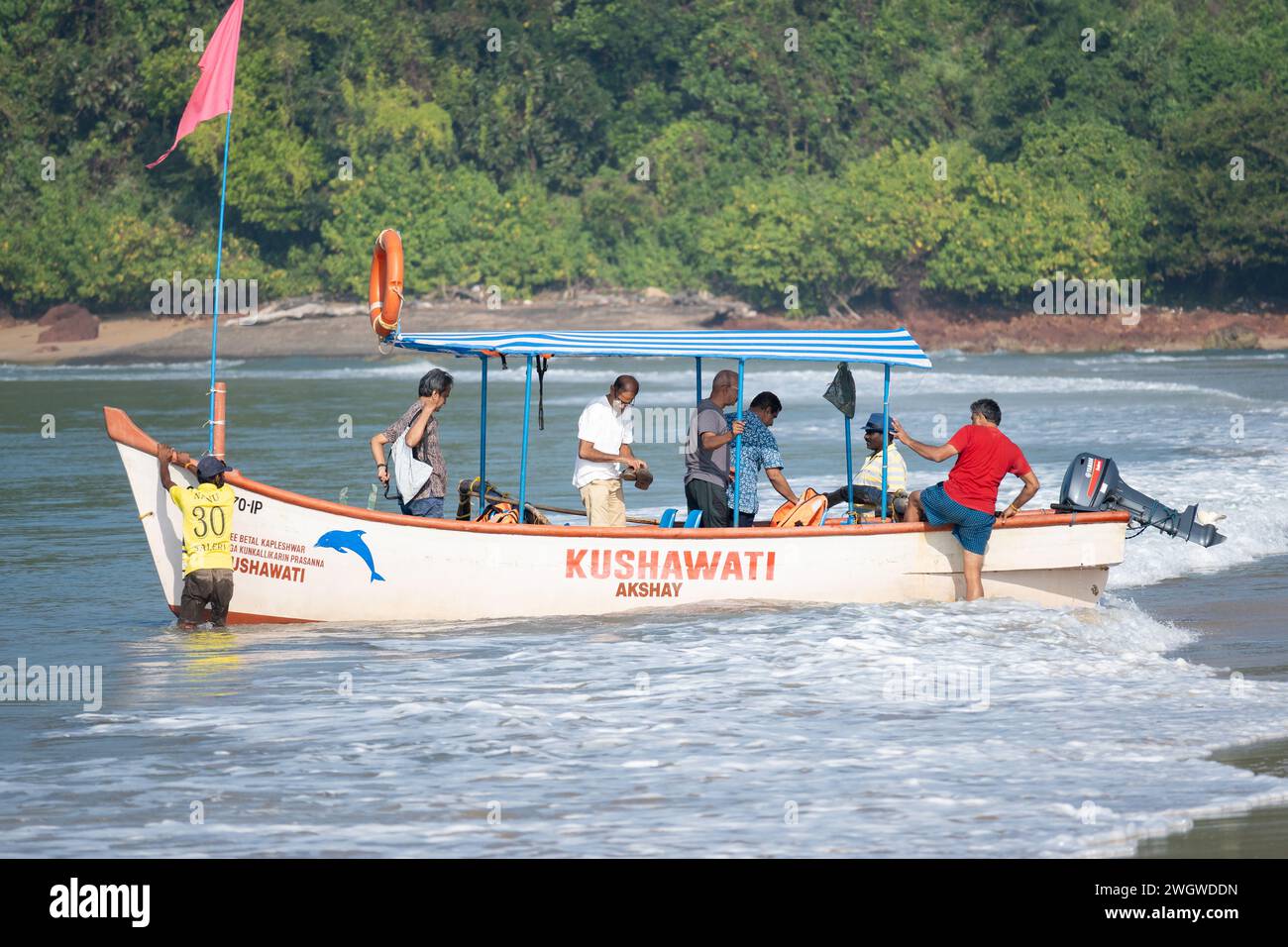 Agonda, Goa, India, Indian tourists on a boat in Agonda beach ...