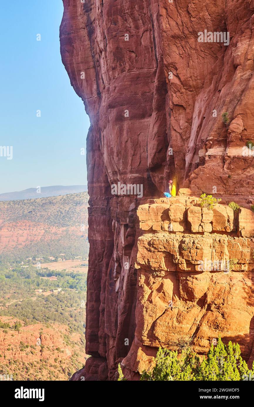 Sedona Sunset with Reflective Person on Cathedral Rock Cliffs Stock ...