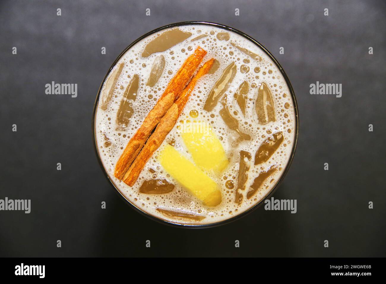 Fizzy Cocktail with Lemon and Cinnamon, Top-Down View Stock Photo - Alamy