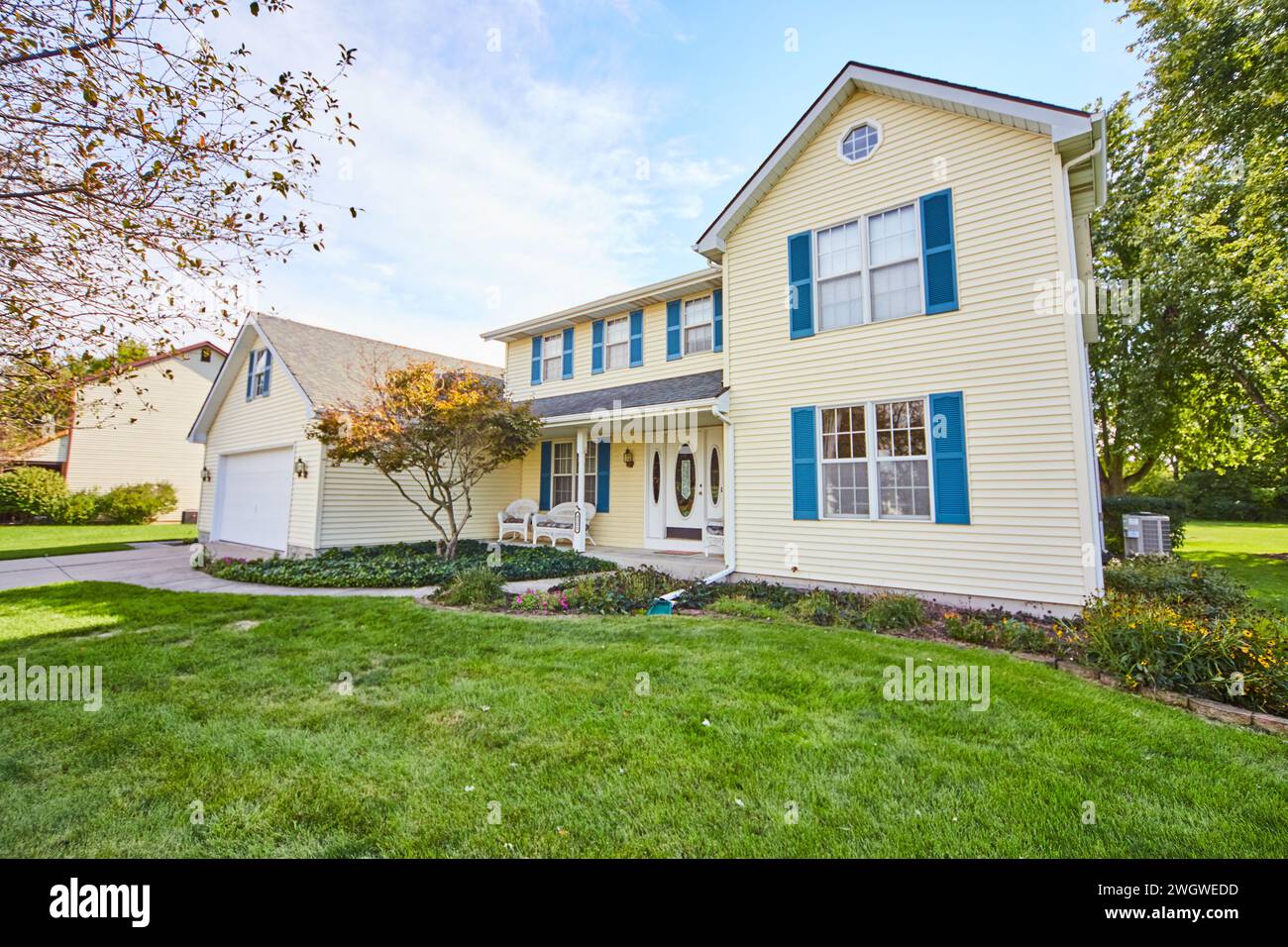 Suburban American Home with Lush Lawn and Porch, Fort Wayne Stock Photo ...