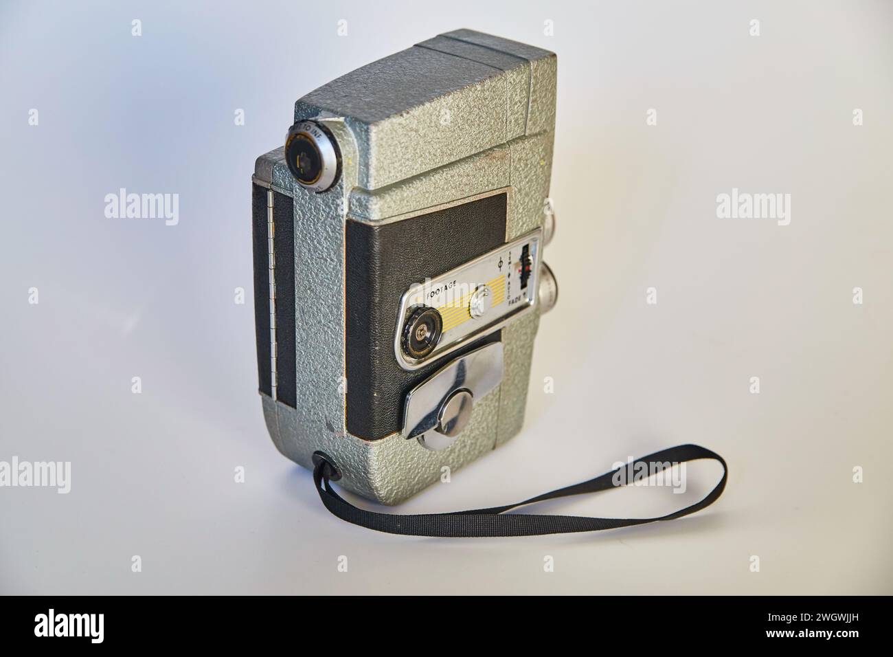 Vintage 8mm Film Camera with Strap on Light Background Stock Photo - Alamy