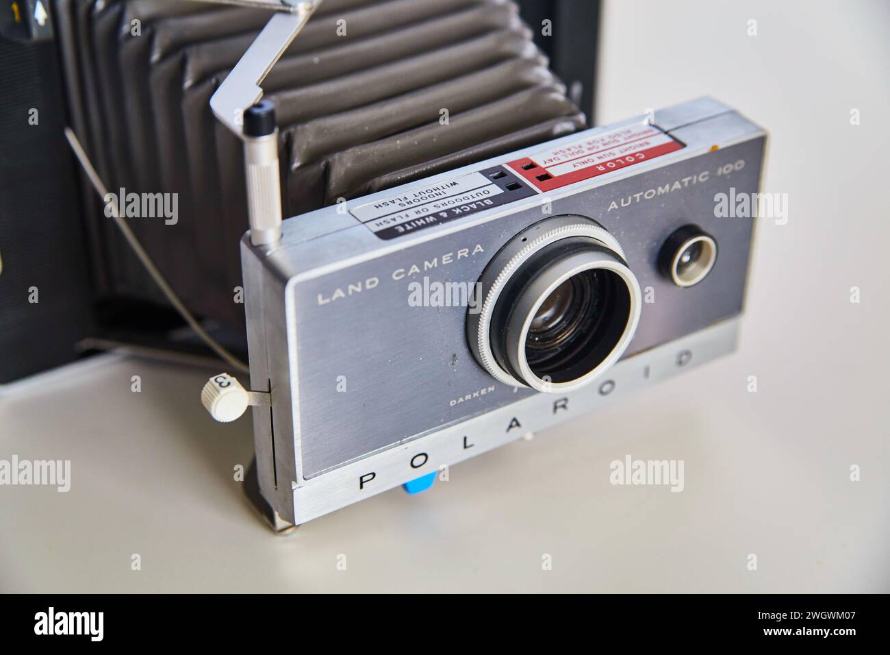 Vintage Polaroid Camera on Neutral Background, Eye-Level View Stock ...
