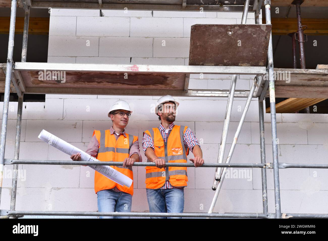 construction manager and architect on site during the construction of a ...