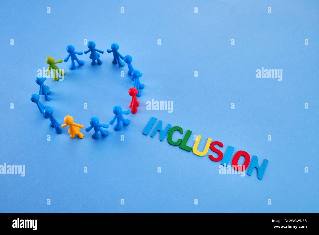 Diversity and inclusion concept. Colorful figurines on blue background ...