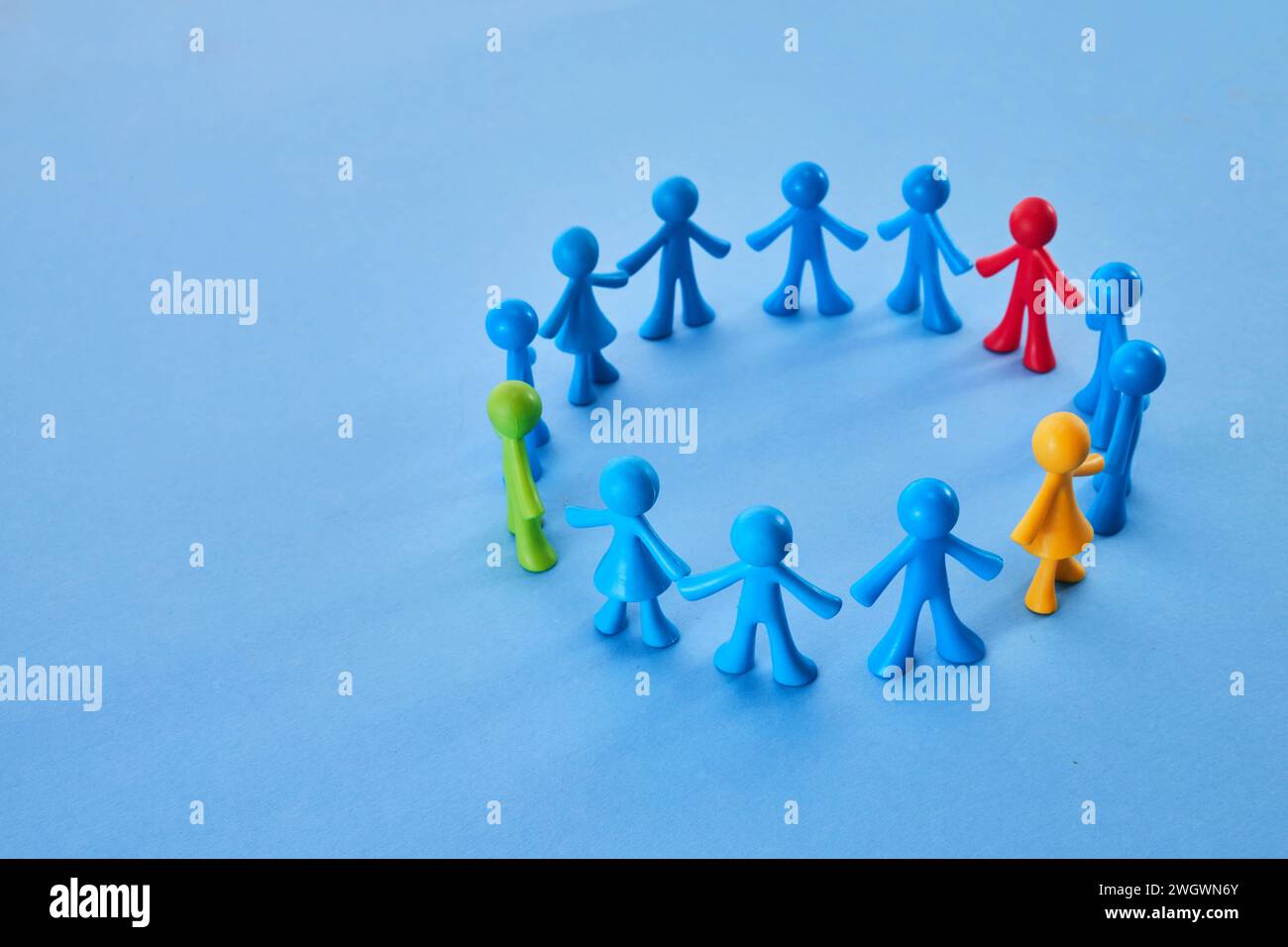 Diversity and inclusion concept. Colorful figurines on blue background ...