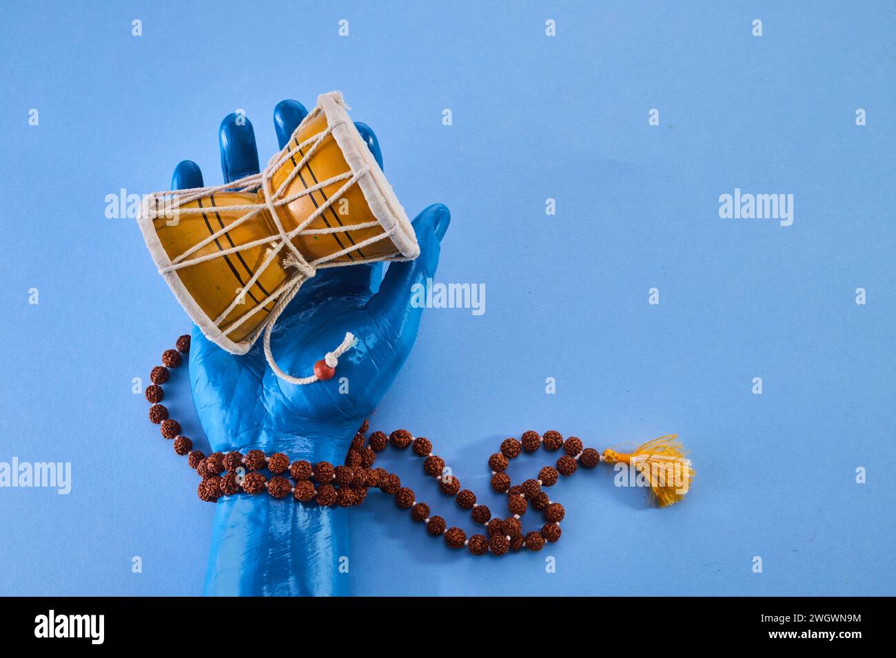 Shivaratri background with Shiva hand and Drum Damroo musical ...