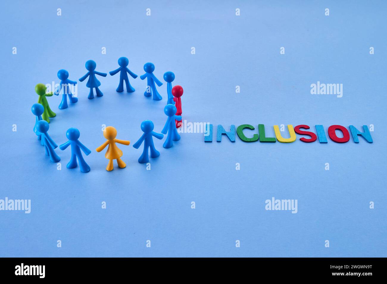 Diversity and inclusion concept. Colorful figurines on blue background ...