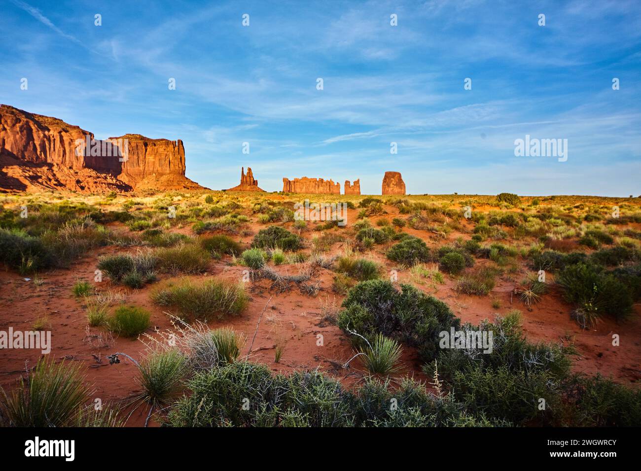 Monument Valley Red Rock Buttes and Desert Flora at Sunset Stock Photo ...