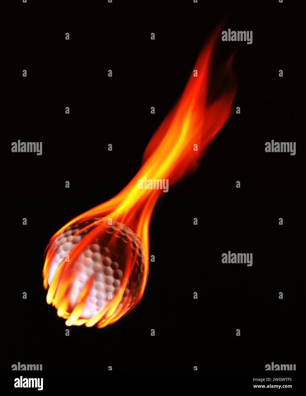flying Golf ball on fire Stock Photo - Alamy