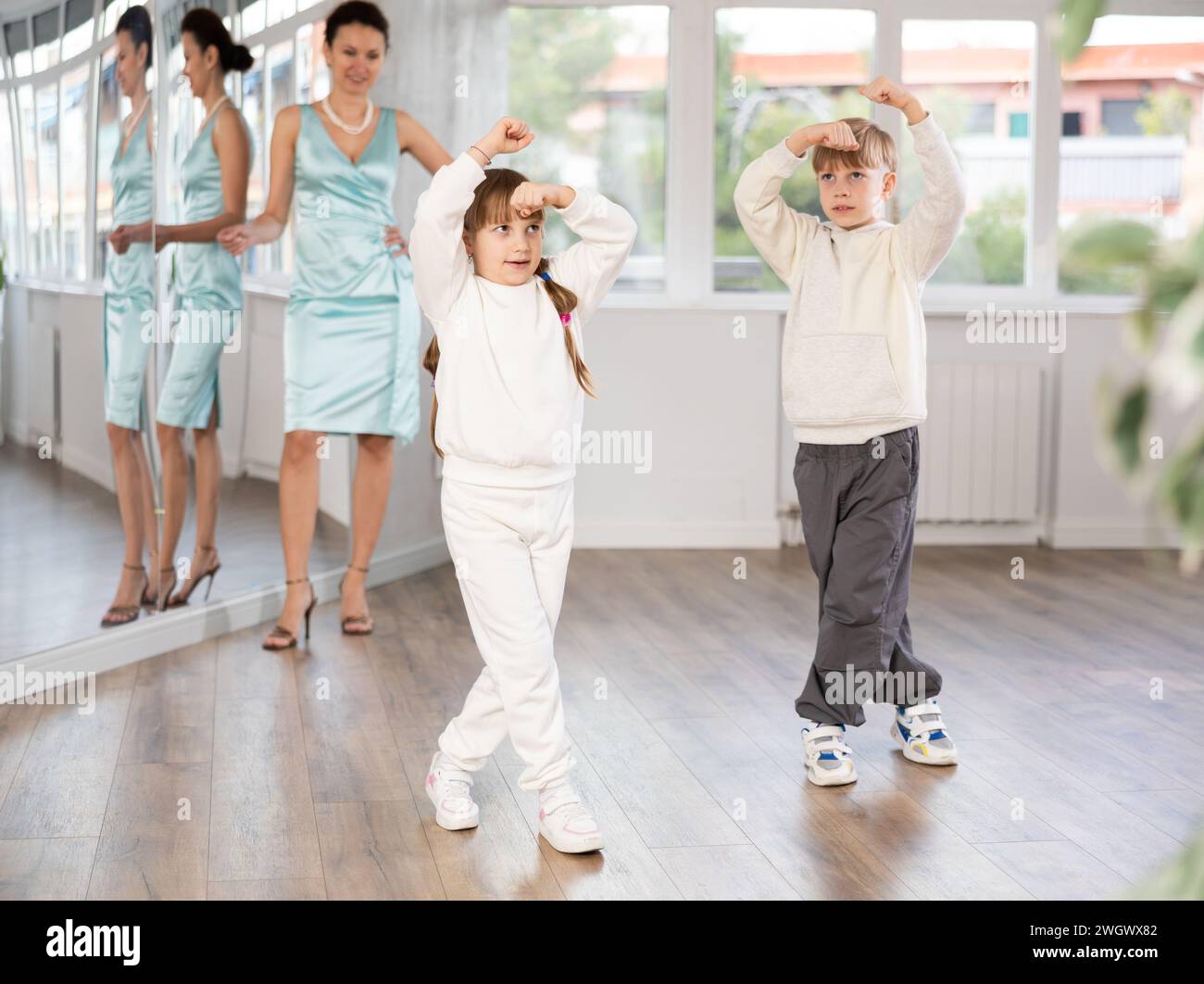 Couple of preteen dancers practicing flamenco during dance lesson Stock ...