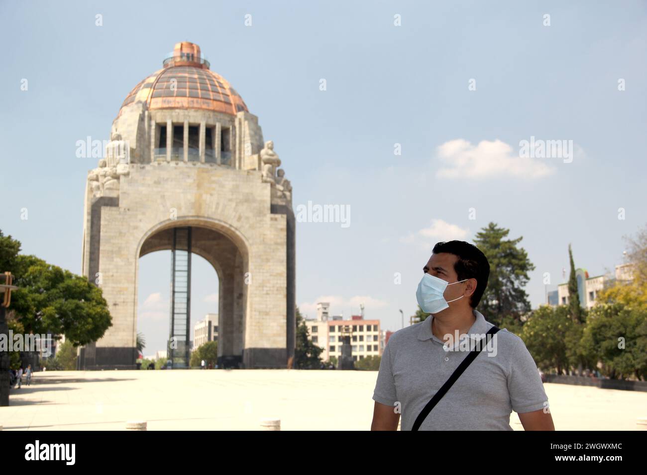 Latin man with protection mask on street of mexico city with the new ...