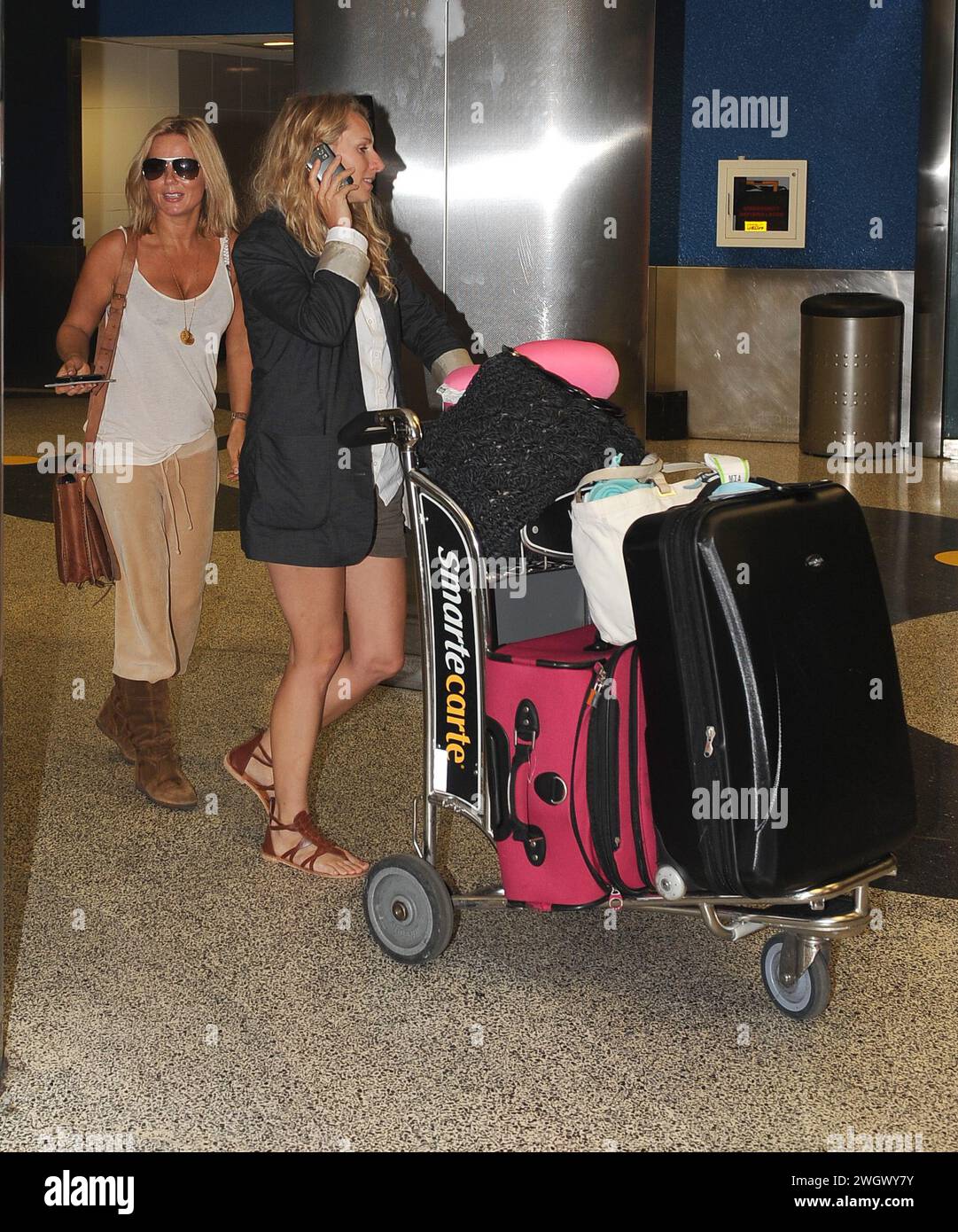 MIAMI, FL - SEPTEMBER 09: Spice Girl Geri Halliwell (L) arrives at ...