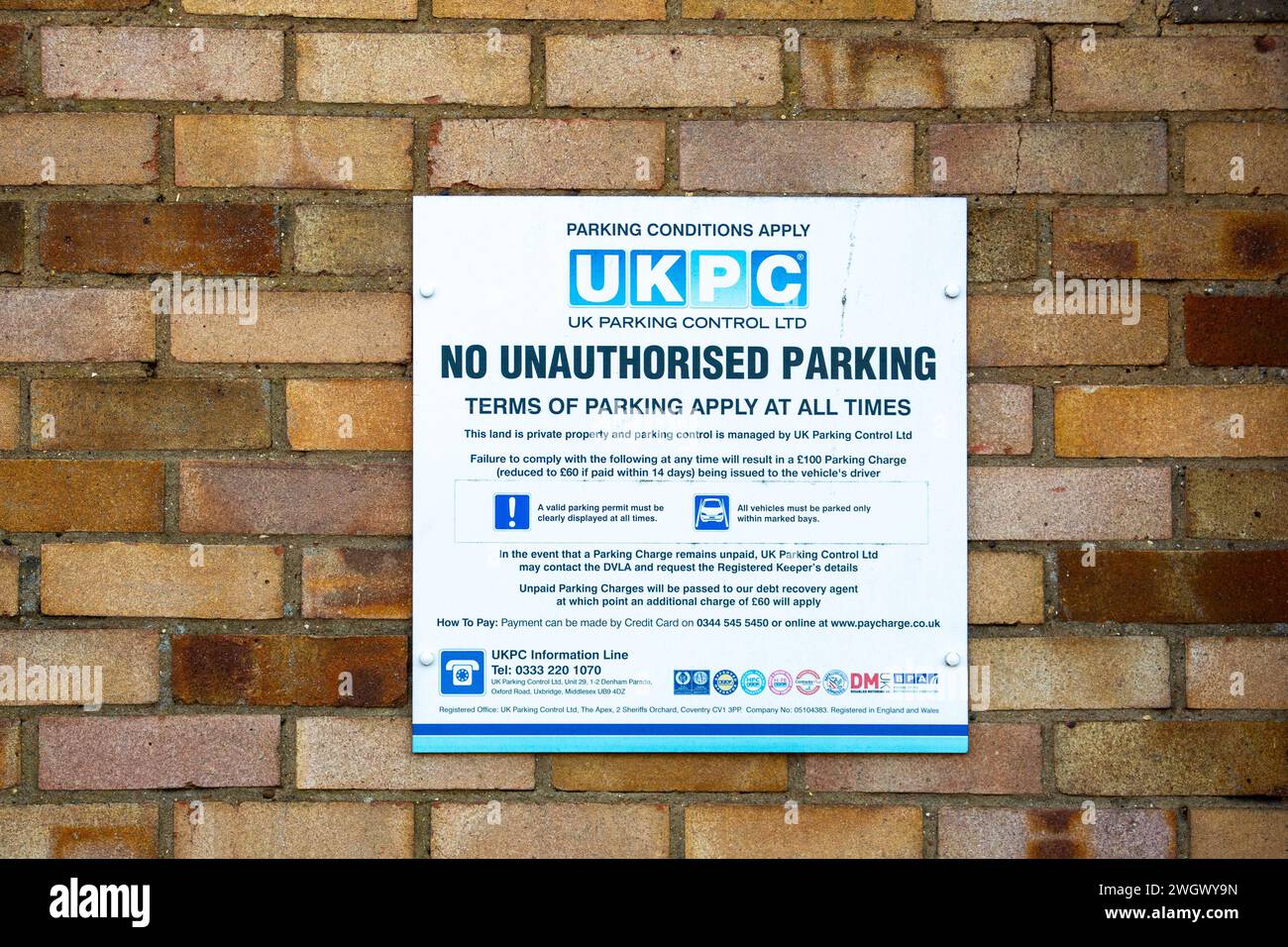 No unauthorised parking signs Stock Photo - Alamy
